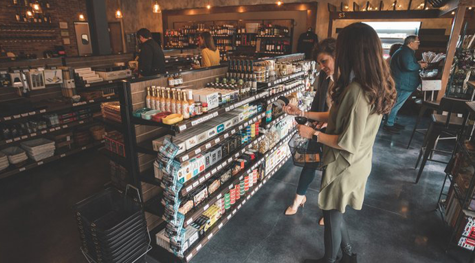 See How DGS Retail Transformed Vintage 53 with Customized Wood Stained Gondola Shelving - DGS Retail